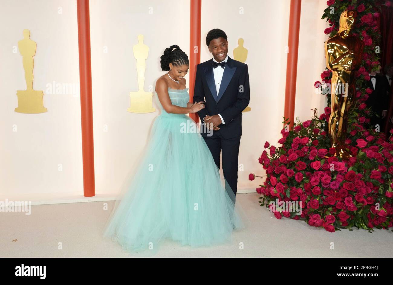 Halle Bailey, left and Branson Bailey arrive at the Oscars on Sunday ...