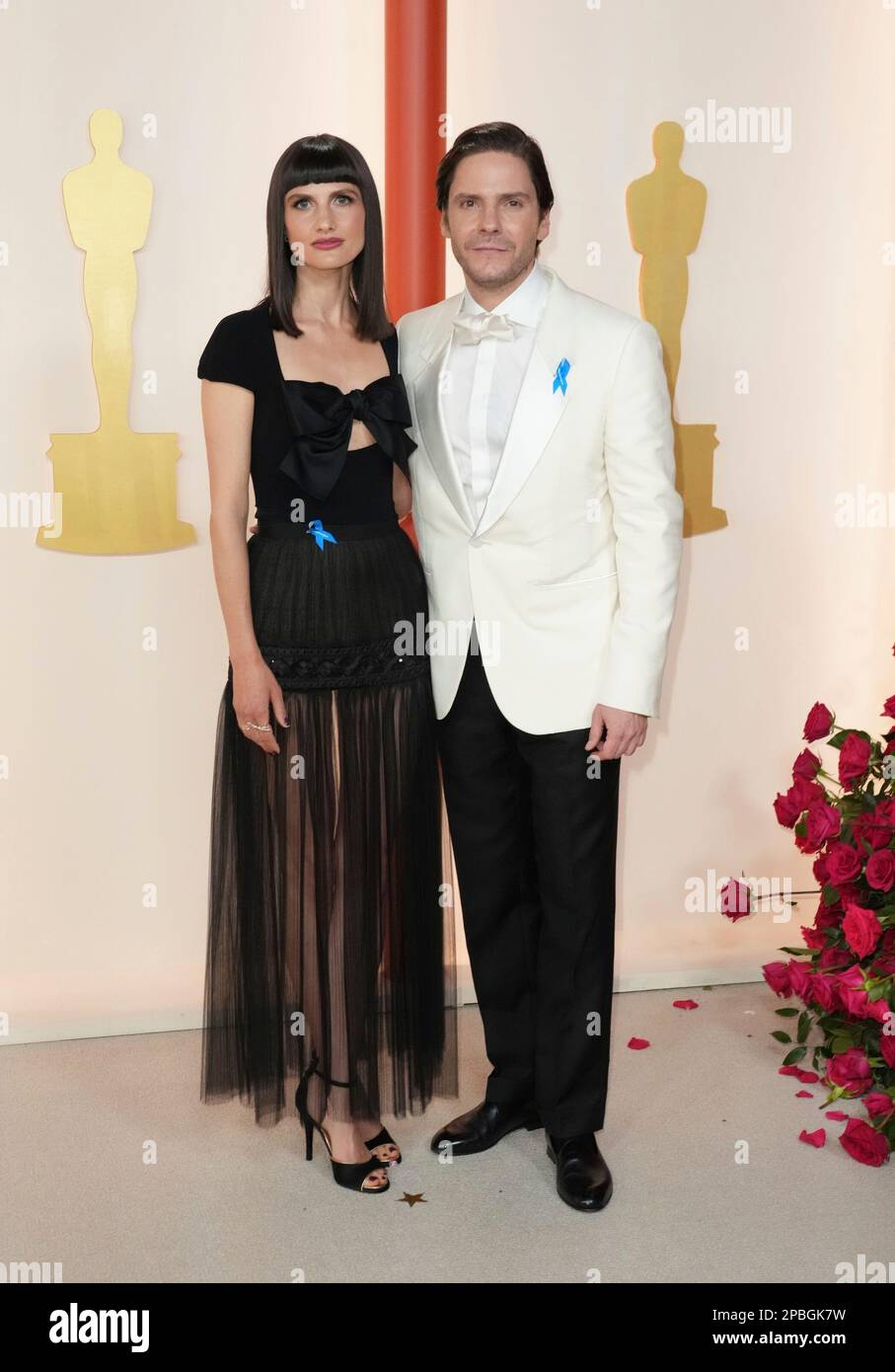 Felicitas Rombold, left and Daniel Bruhl arrive at the Oscars on Sunday ...