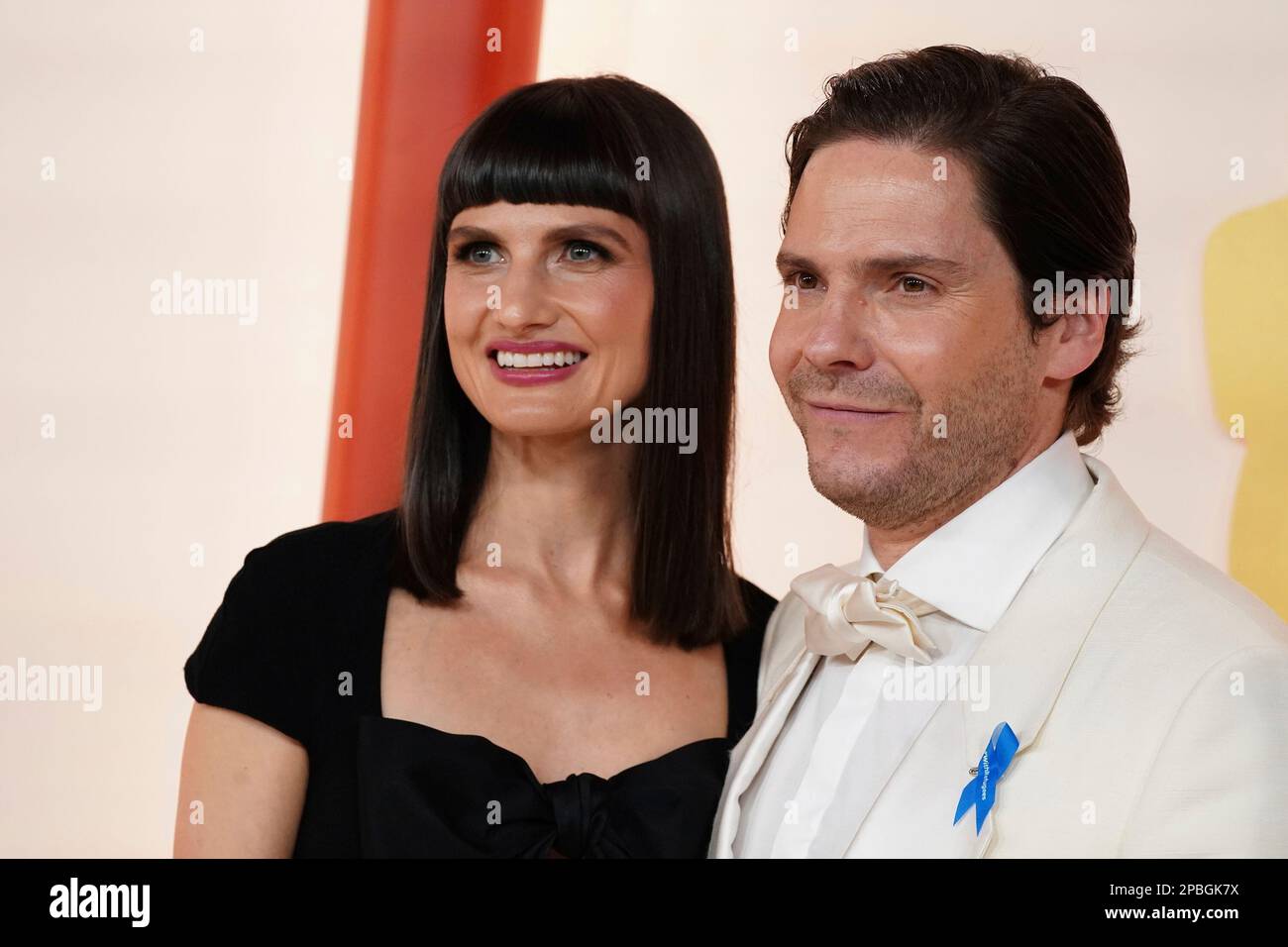 Felicitas Rombold, left and Daniel Bruhl arrive at the Oscars on Sunday ...