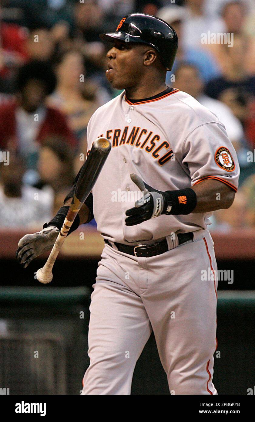 San Francisco Giants' Barry Bonds reacts to a big swing for a strike on ...