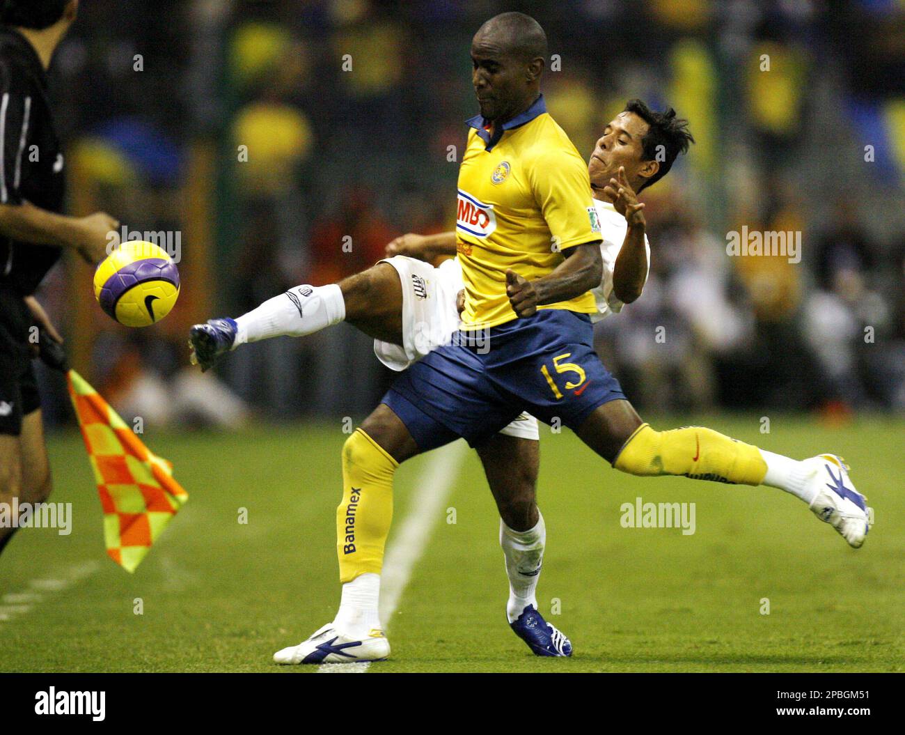 America's Felipe Baloy, front, of Mexico battles for the ball with ...