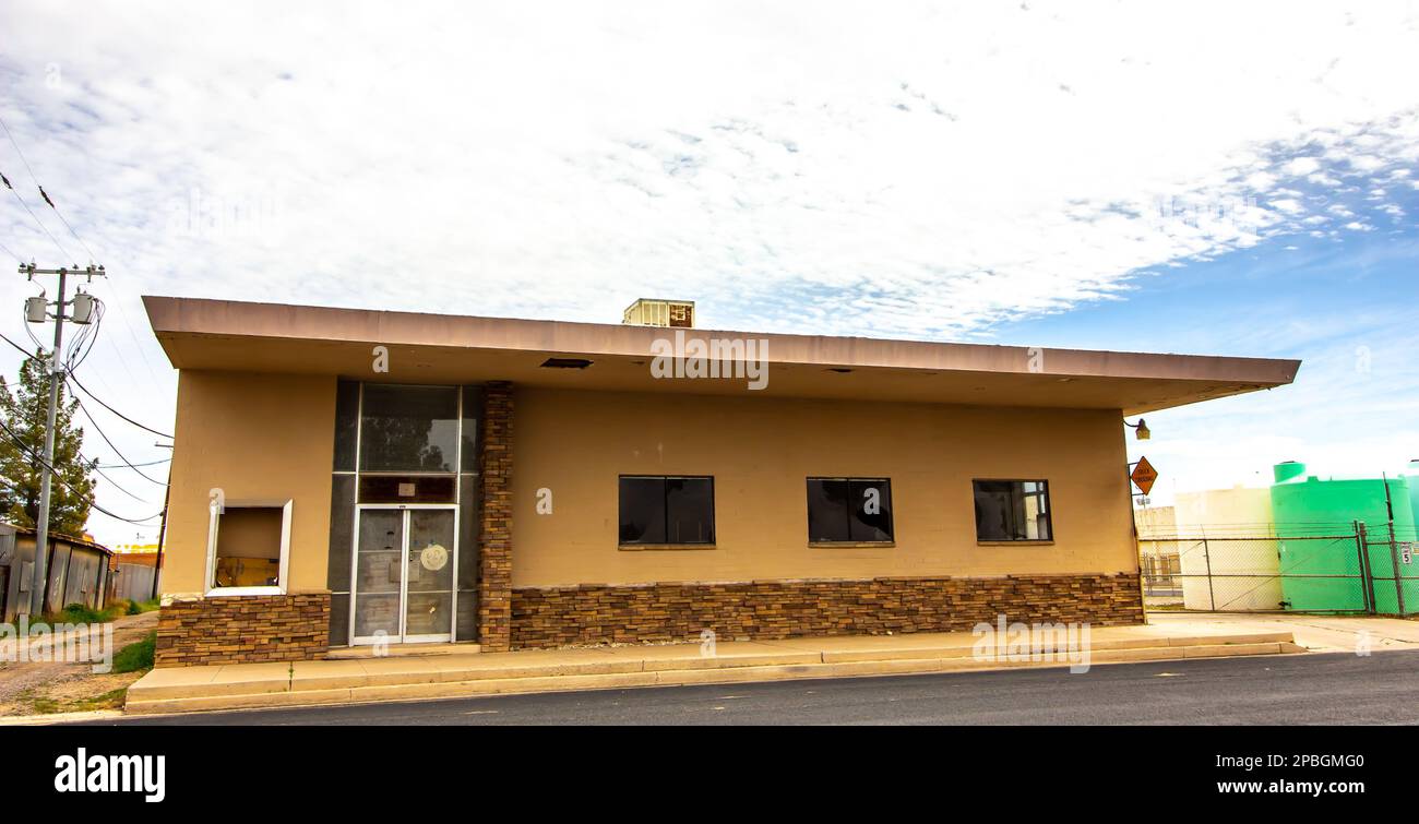 Abandoned Commercial Building With Broken Windows Stock Photo - Alamy