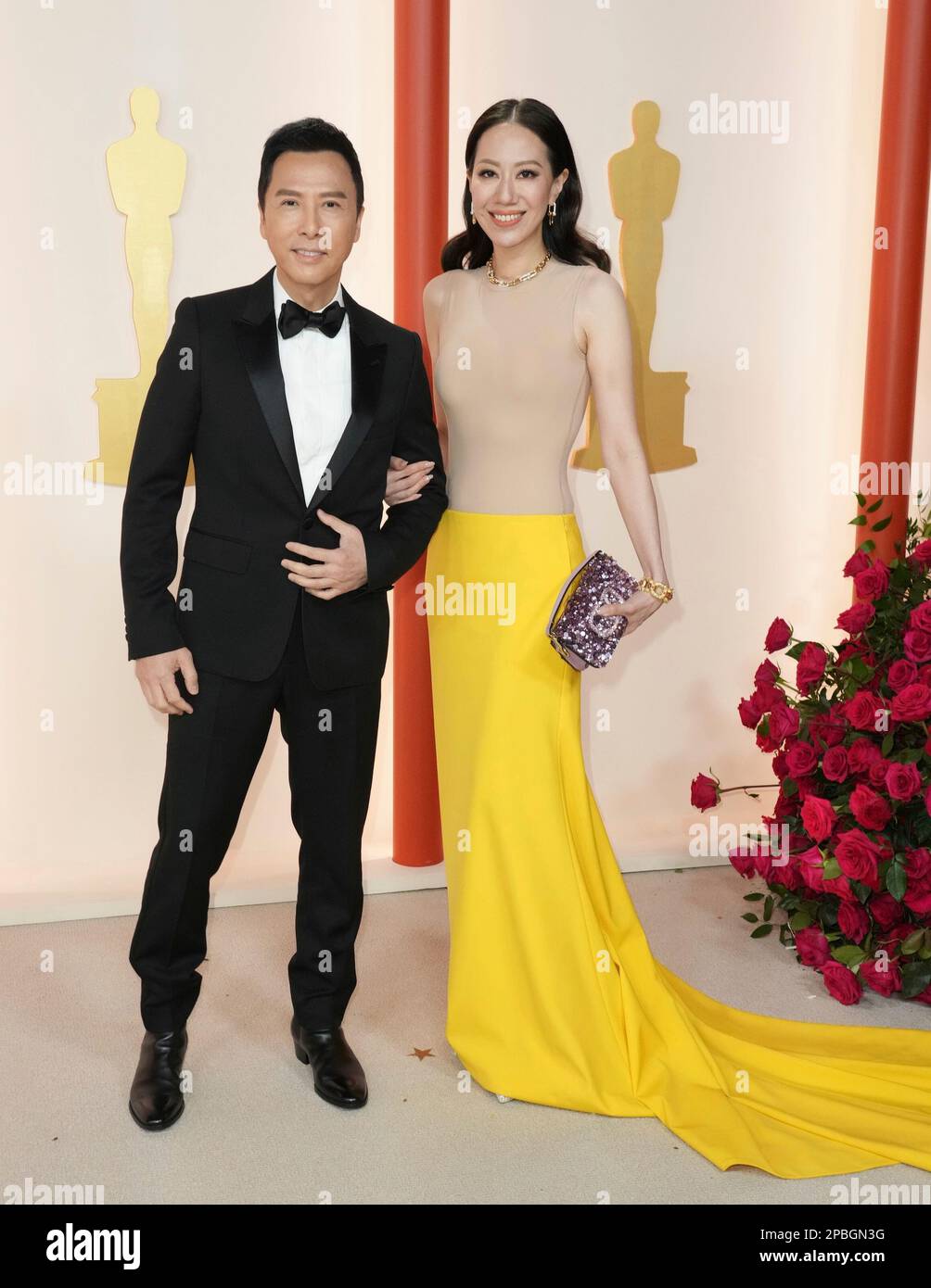 Donnie Yen, left and Cissy Wang arrive at the Oscars on Sunday, March ...