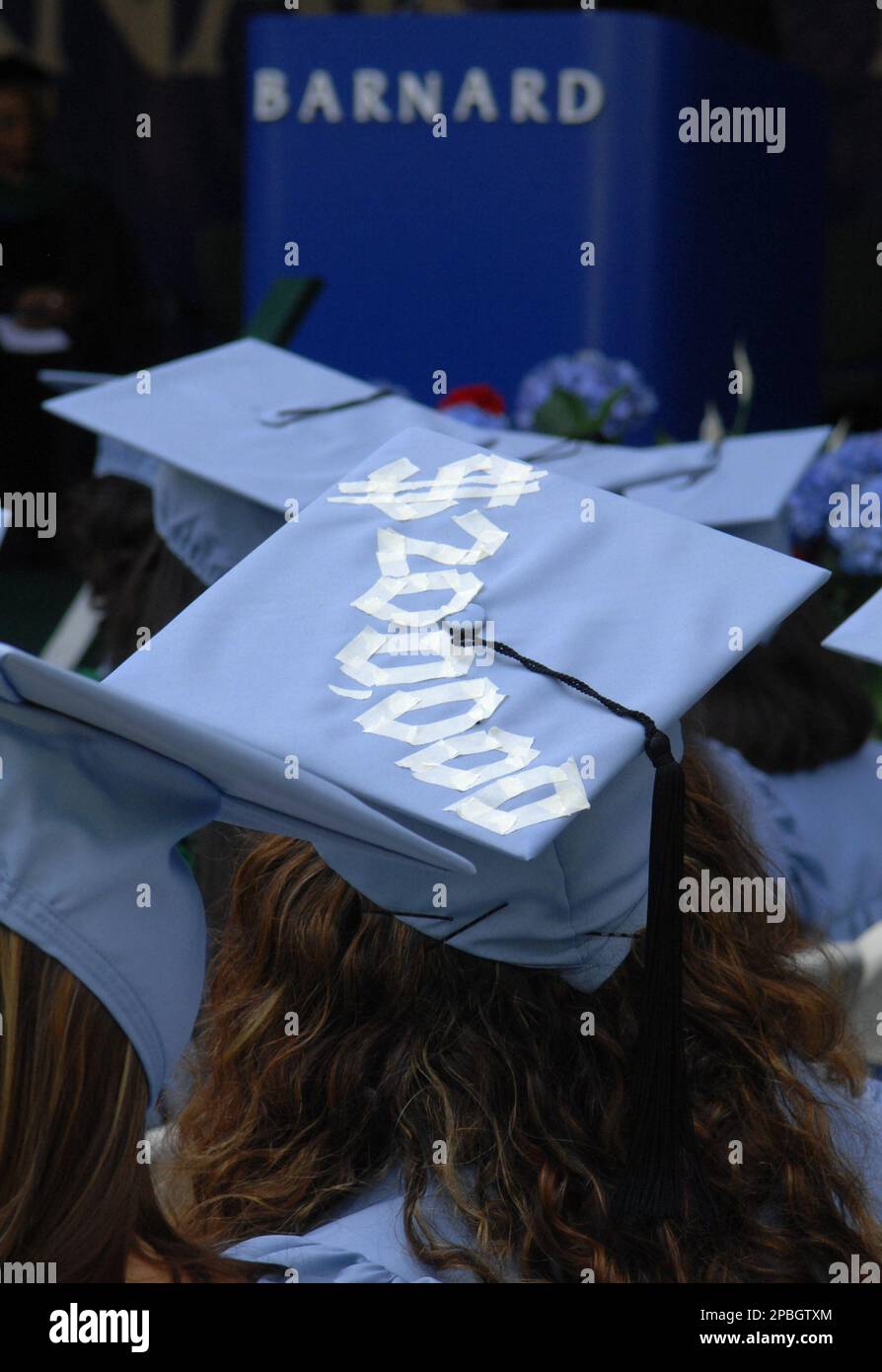 The approximate cost of a four-year education is taped onto the mortar ...