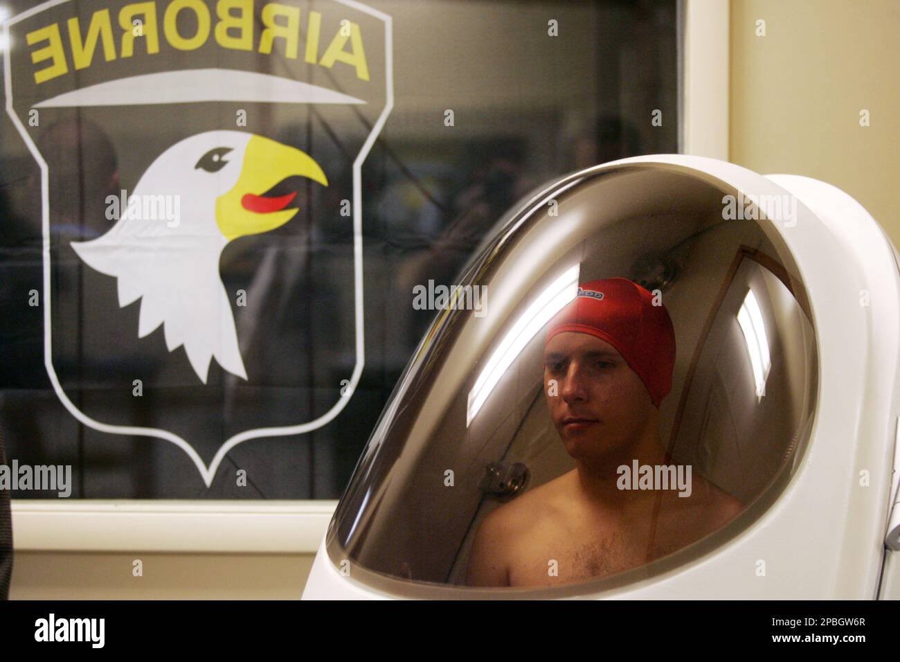 Sgt. Zachary Stotz sits in a body composition assessment machine called ...