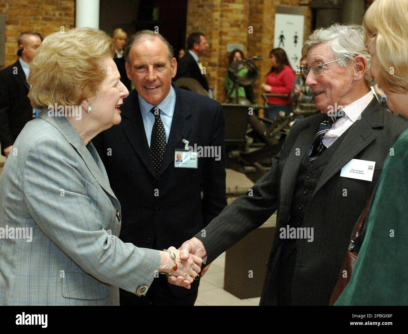 Former British Prime Minister Margaret Thatcher shakes hands with ...