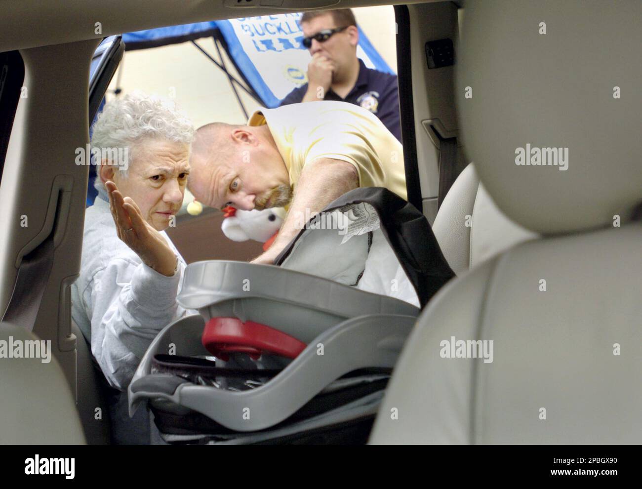 Deborah Baer, left, child passenger safety coordinator for Safe Kids ...