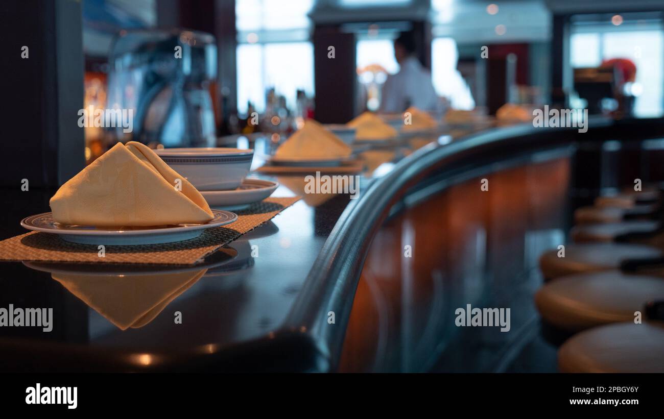 Bar counter in restaurant. Bar counter setting with tea crockery and ...