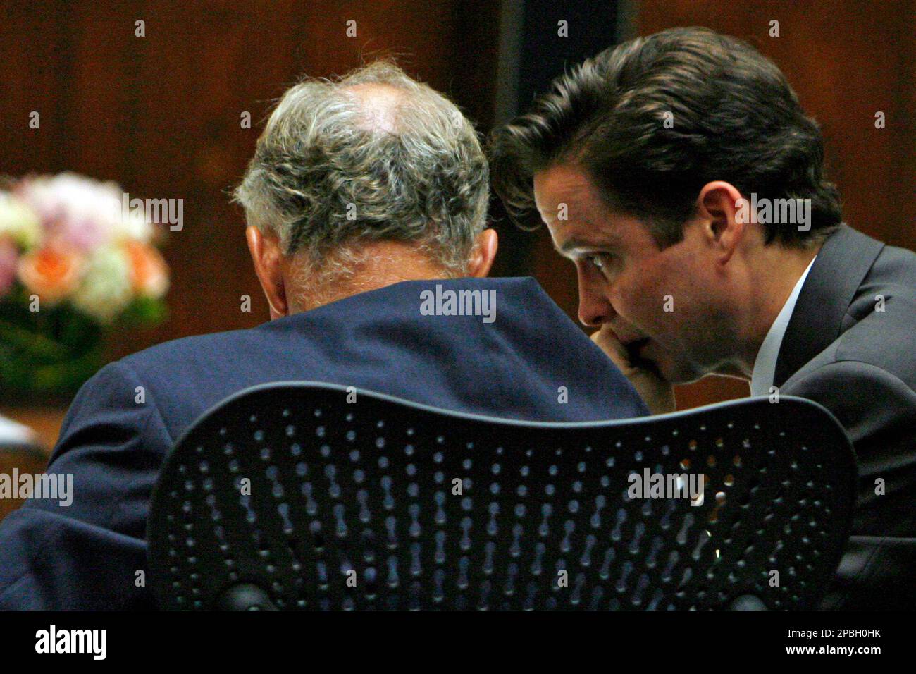 Prosecutor Alan Jackson, right, confers with Pat Dixon during morning ...