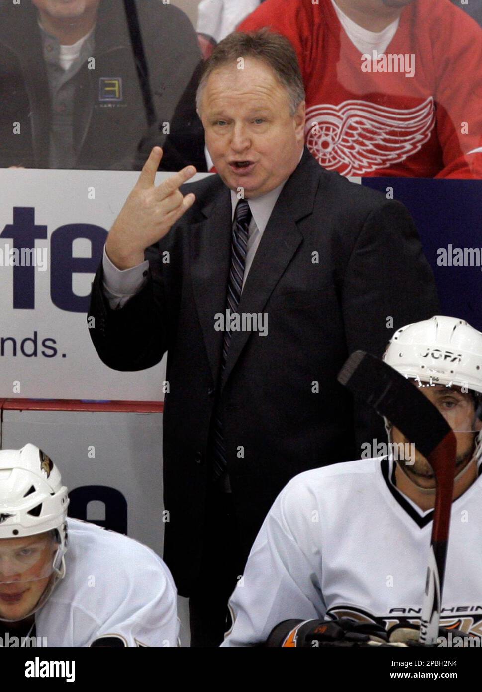 Anaheim Ducks head coach Randy Carlyle signals from the bench during ...
