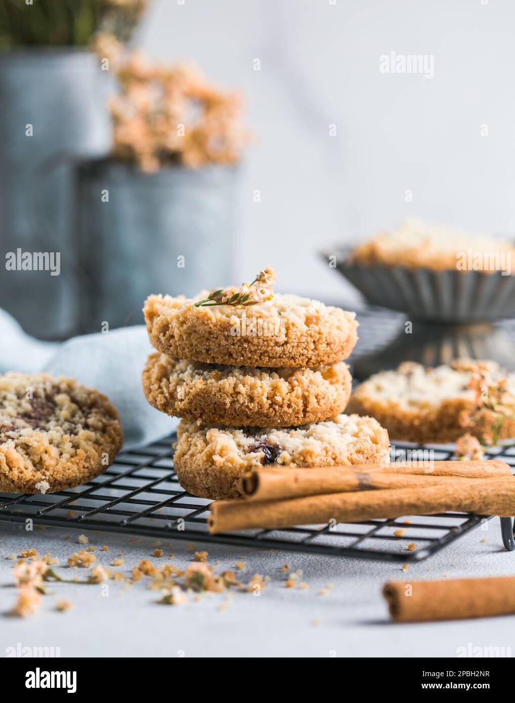 round festive pastry buiscuits cookies with a raspberry jam on a light ...