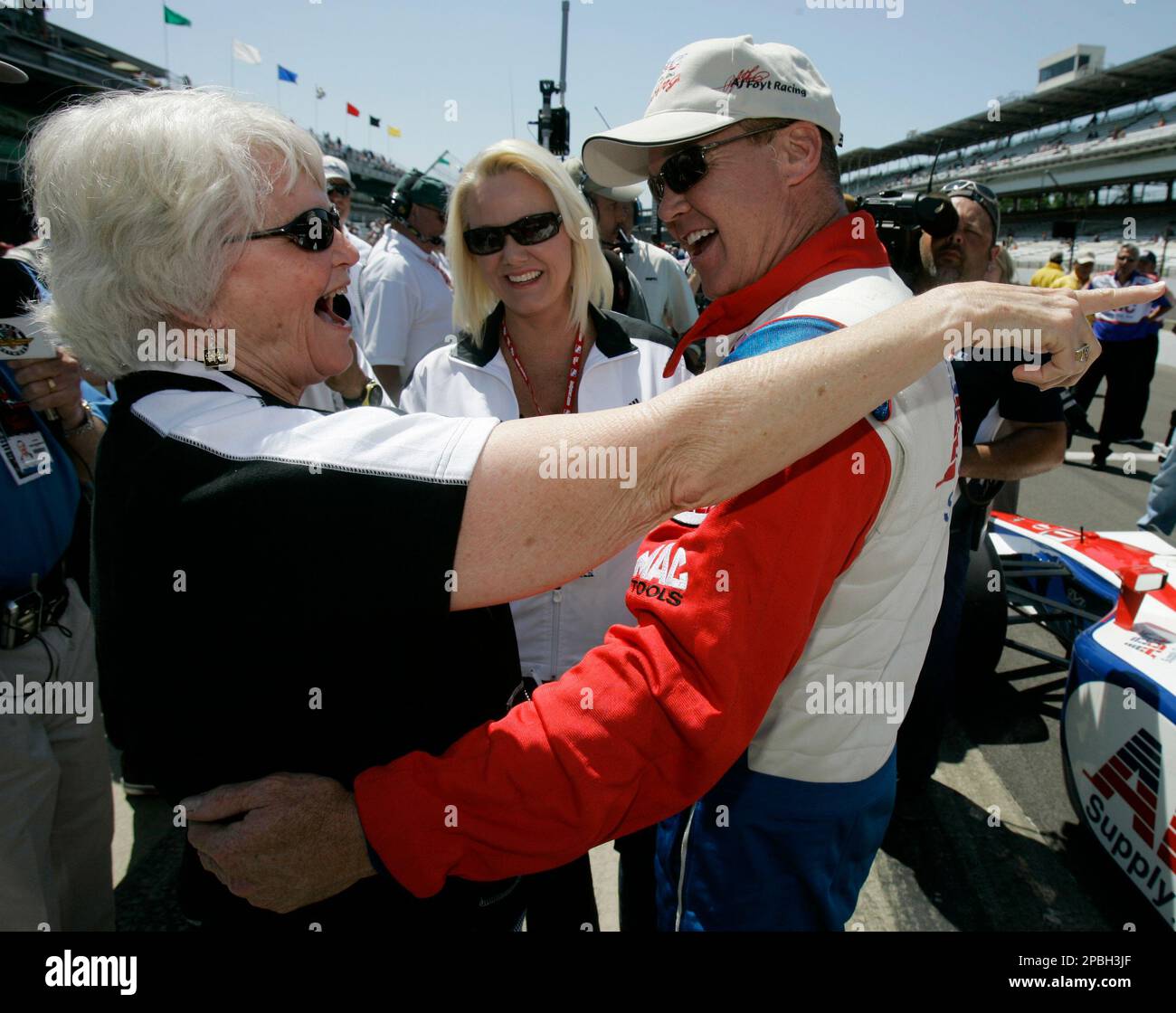 Race driver Al Unser Jr., right, celebrates with his mother Wanda Unser ...