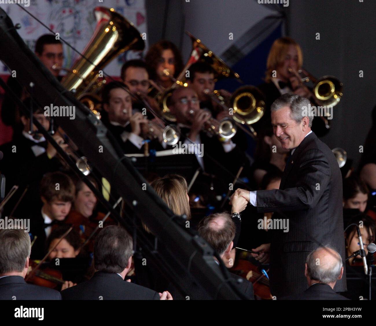 President Bush welcomes orchestra conductor JoAnn Falletta back to the ...