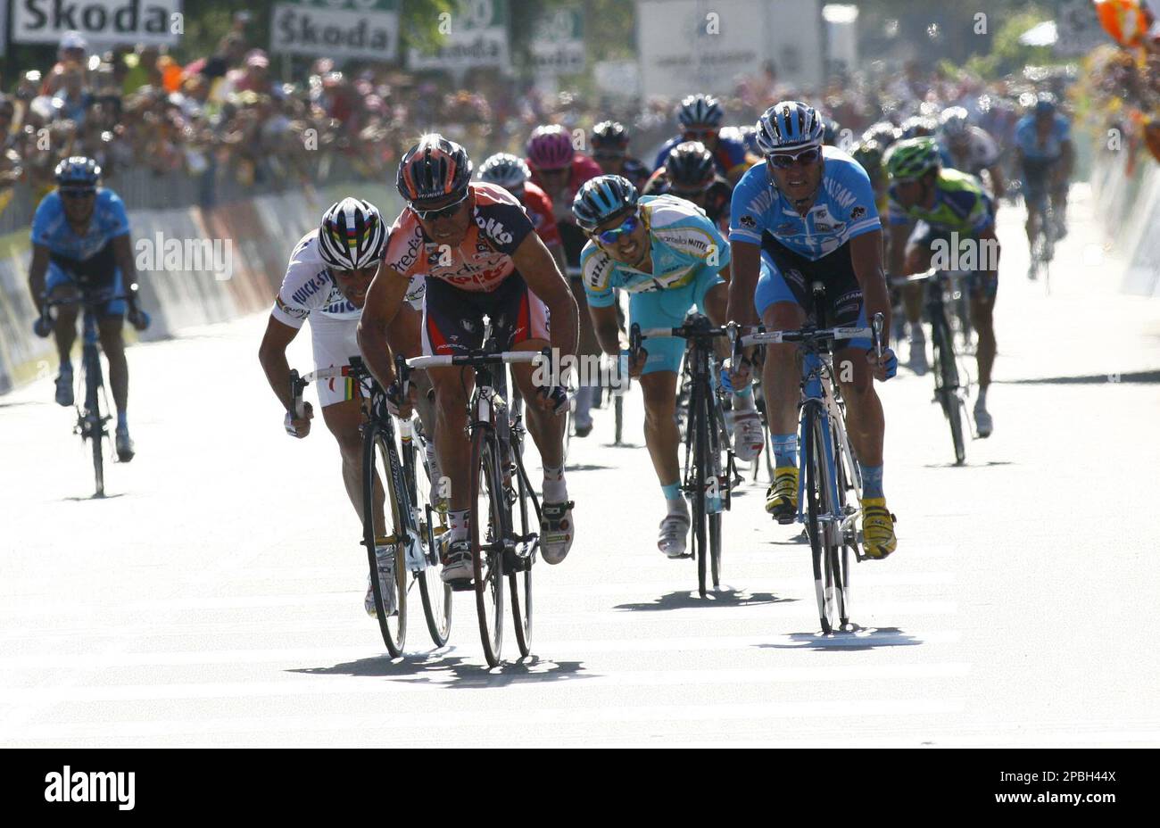 Robbie Mc Ewen, of Australia, crosses the finish line to win the second ...