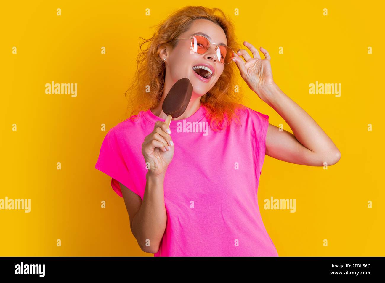 positive woman with icelolly ice cream on background. photo of woman ...