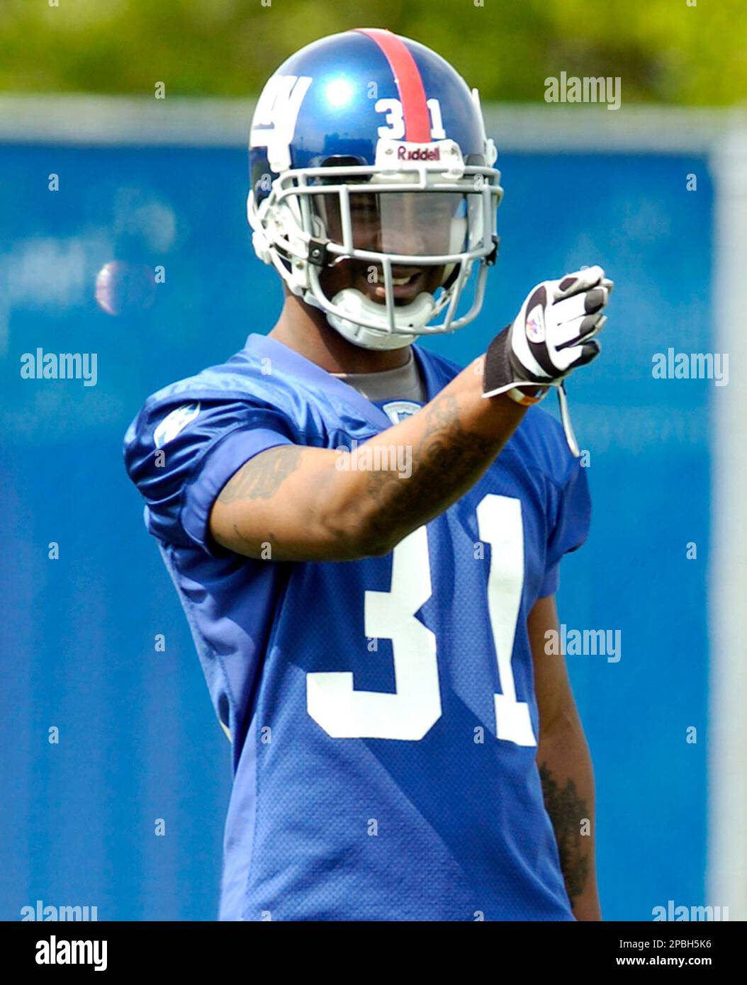 New York Giants cornerback Aaron Ross reacts during NFL football rookie ...