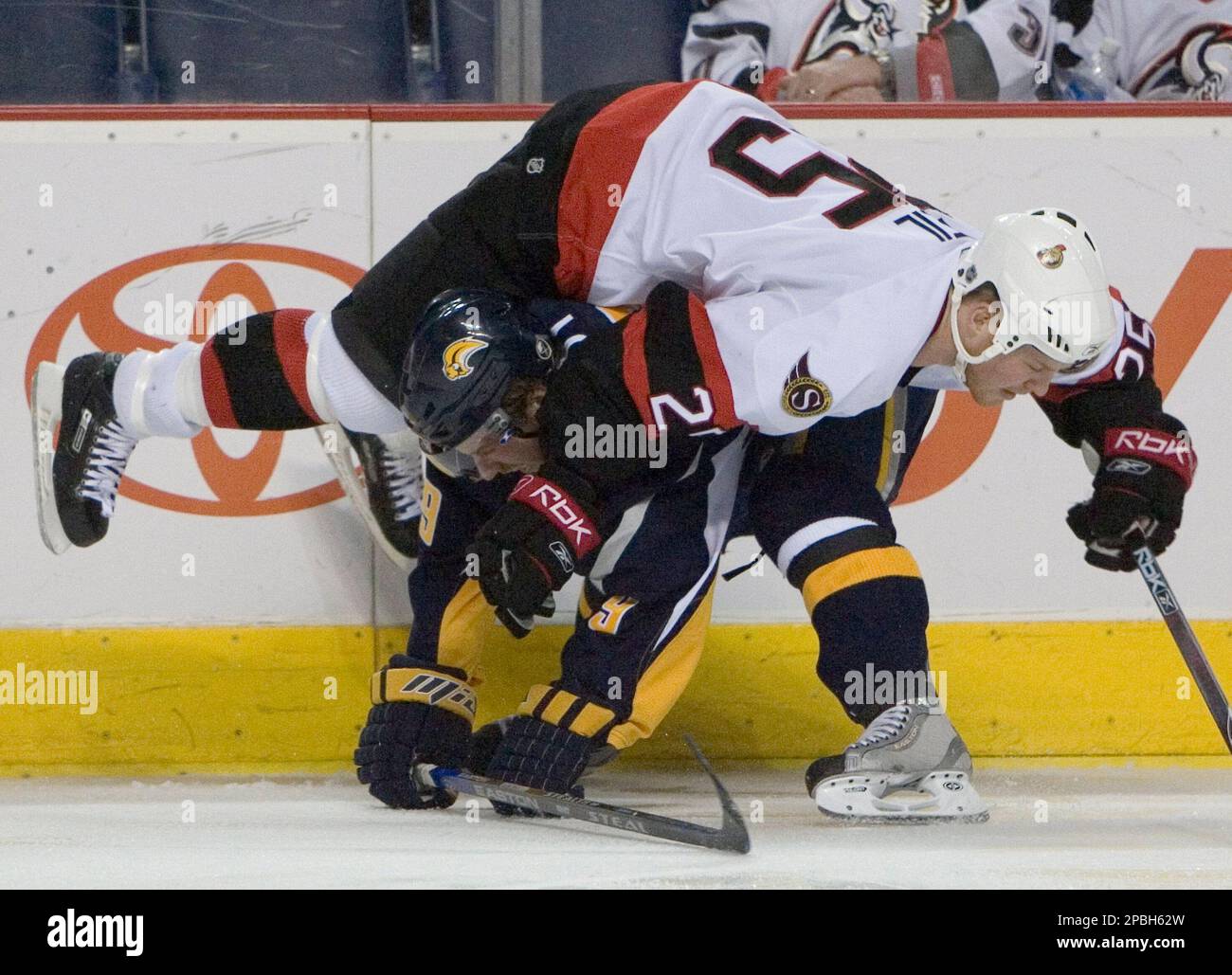 Ottawa Senators Chris Neil (25) picks up a holding penalty as he is ...