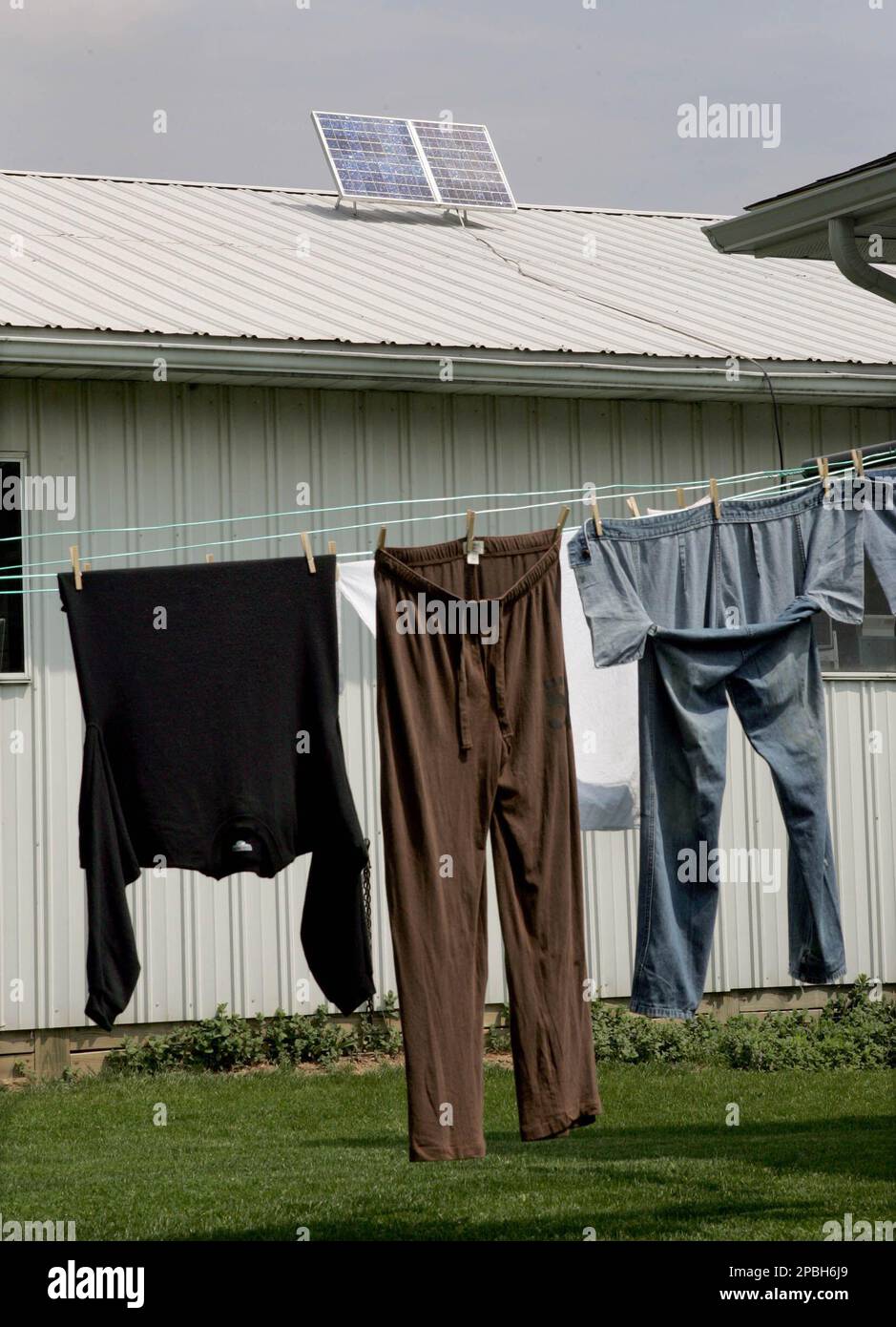 A solar panel is seen Friday, May 11, 2007, on the rooftop of an Amish ...