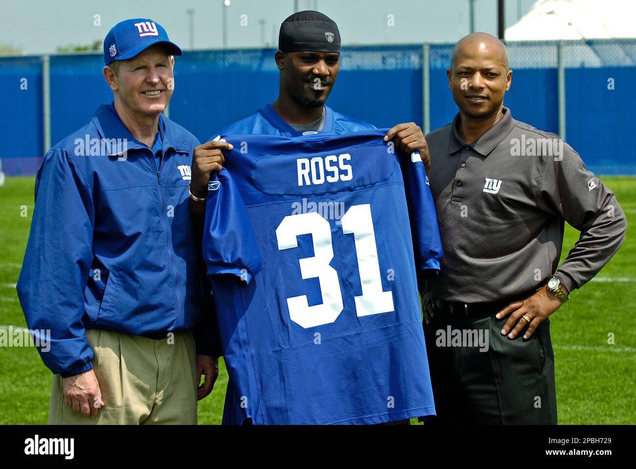 New York Giants cornerback Aaron Ross poses with coach Tom Coughlin ...