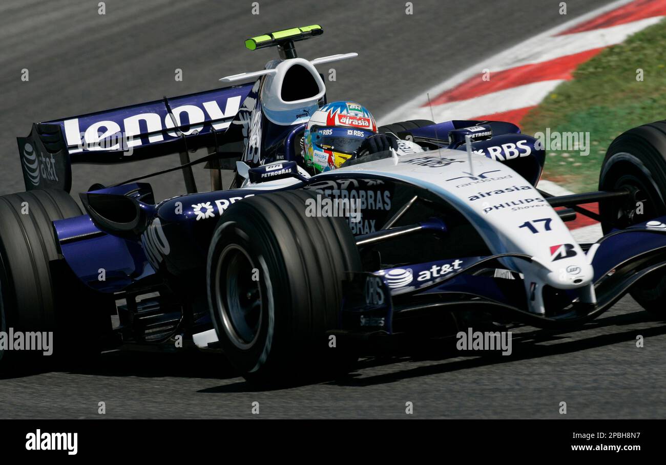 Austrian Williams Formula One driver Alexander Wurz steers into a turn ...