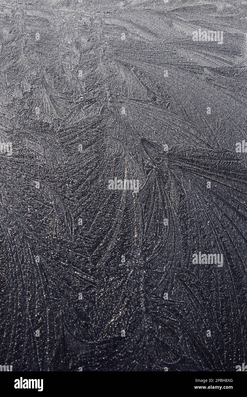 Frost with feather like patterns on the hood of my car in early March ...