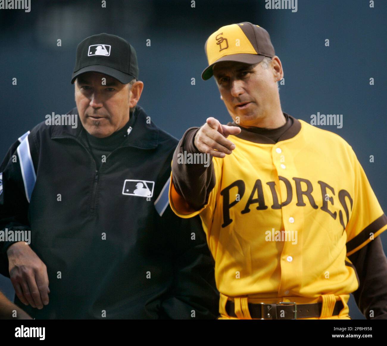 San Diego Padres manager Bud Black, right, wearing the team's 1973 ...
