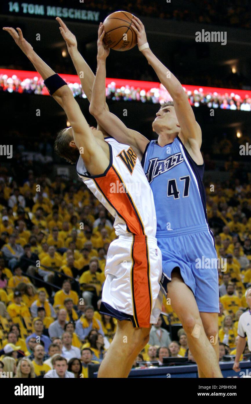 Utah Jazz's Andrei Kirilenko, right, of Russia, shoots against Golden ...