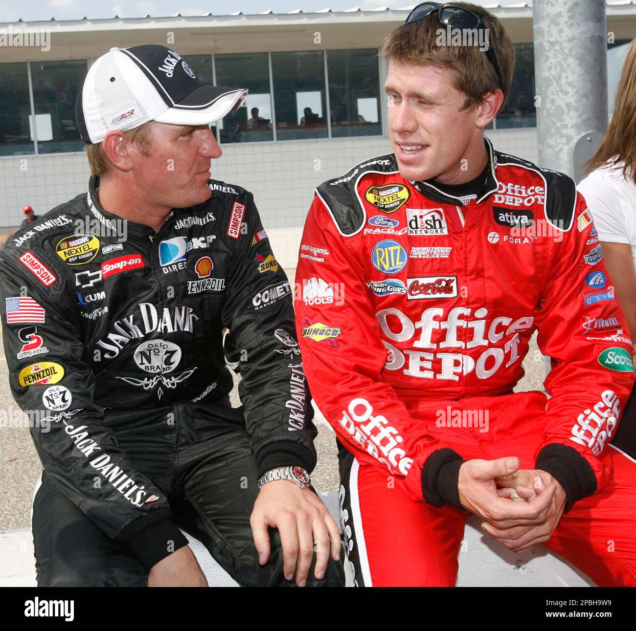 Clint Bowyer, left, and Carl Edwards talk after qualifying for the ...