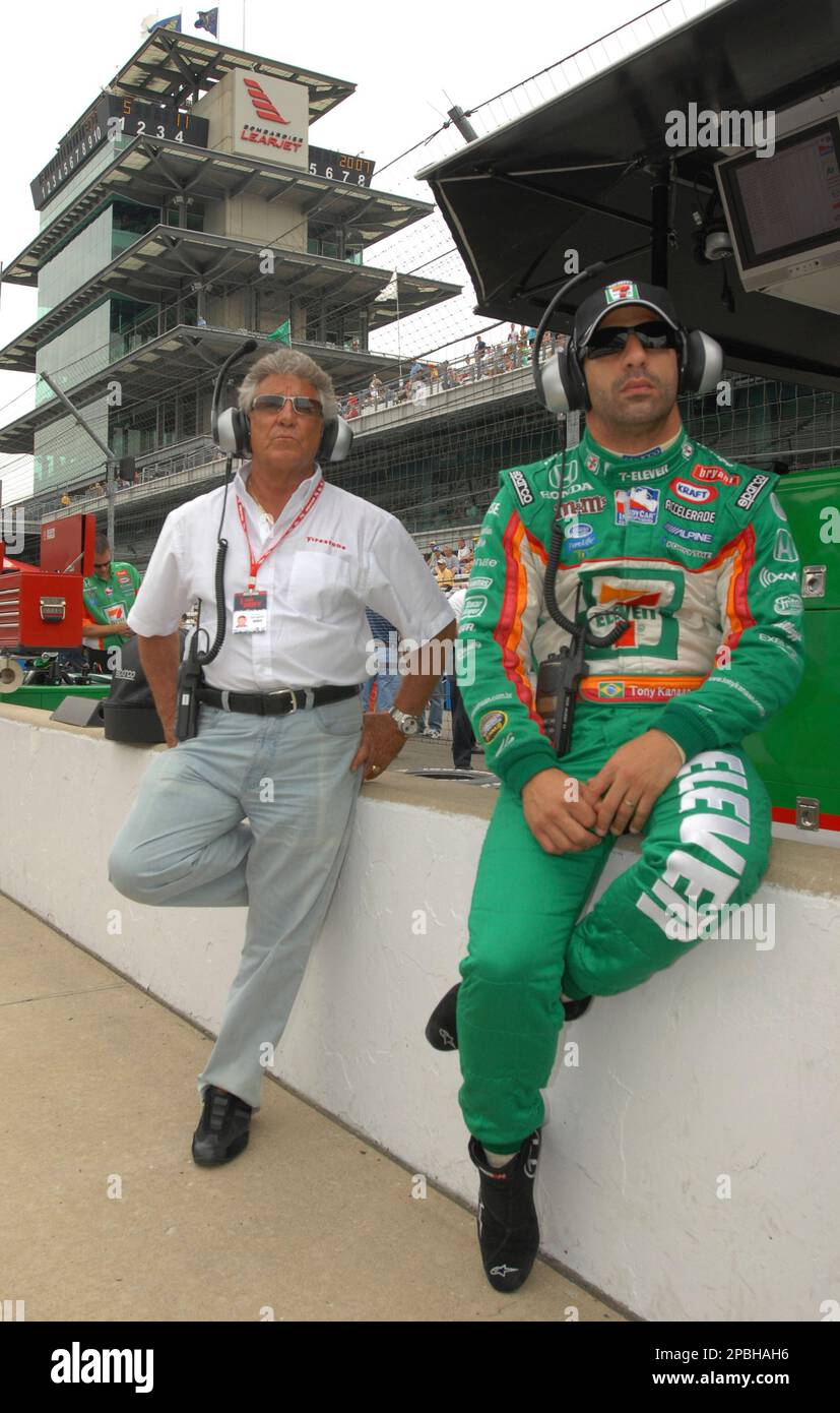 Race car driver Tony Kanaan of Brazil, left, and 1969 Indy 500 champion ...
