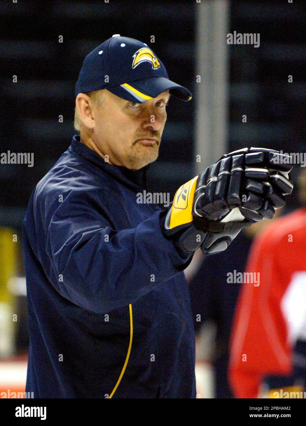 Buffalo Sabres coach Lindy Ruff instructs his team during hockey ...
