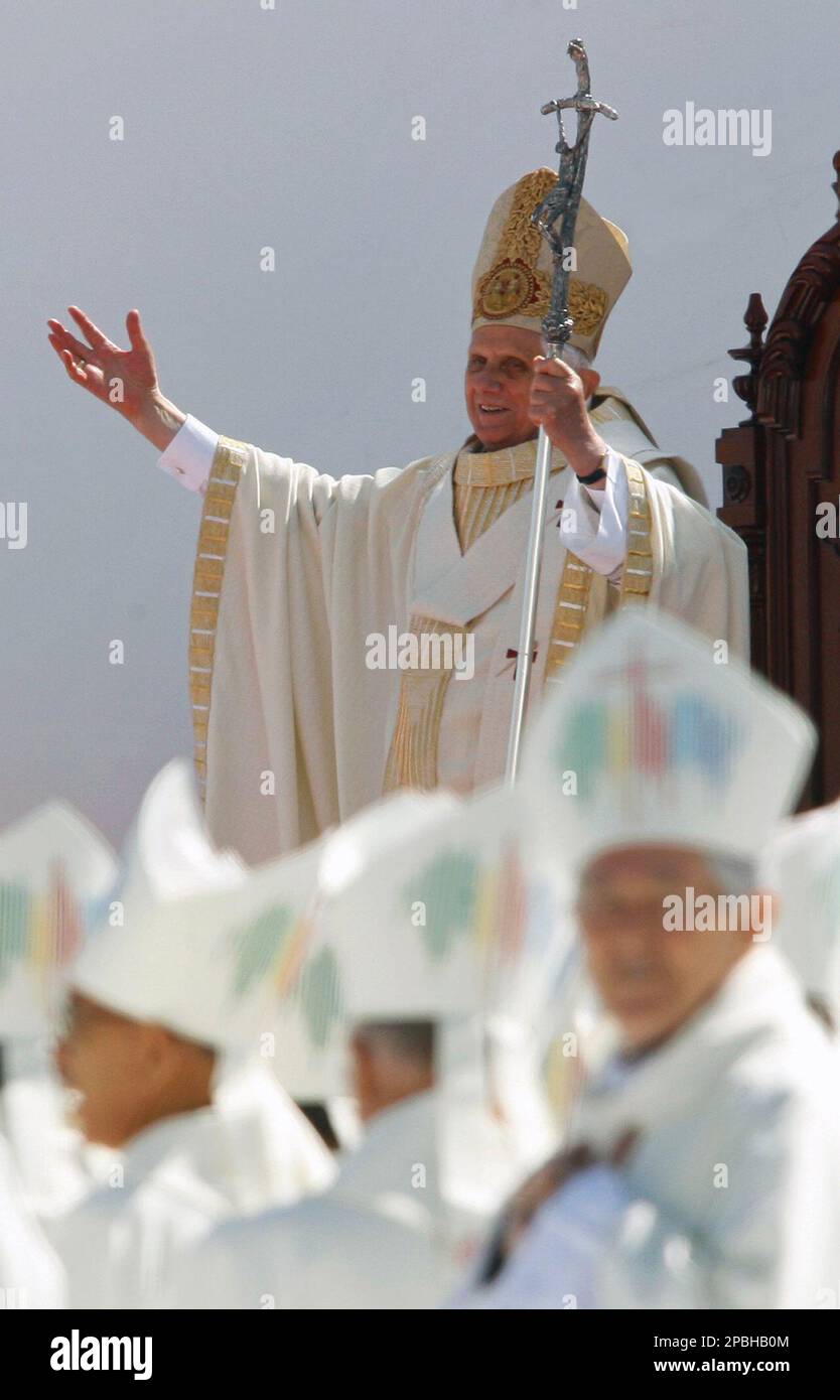 Pope Benedict XVI waves after the canonization mass for Friar Antonio ...