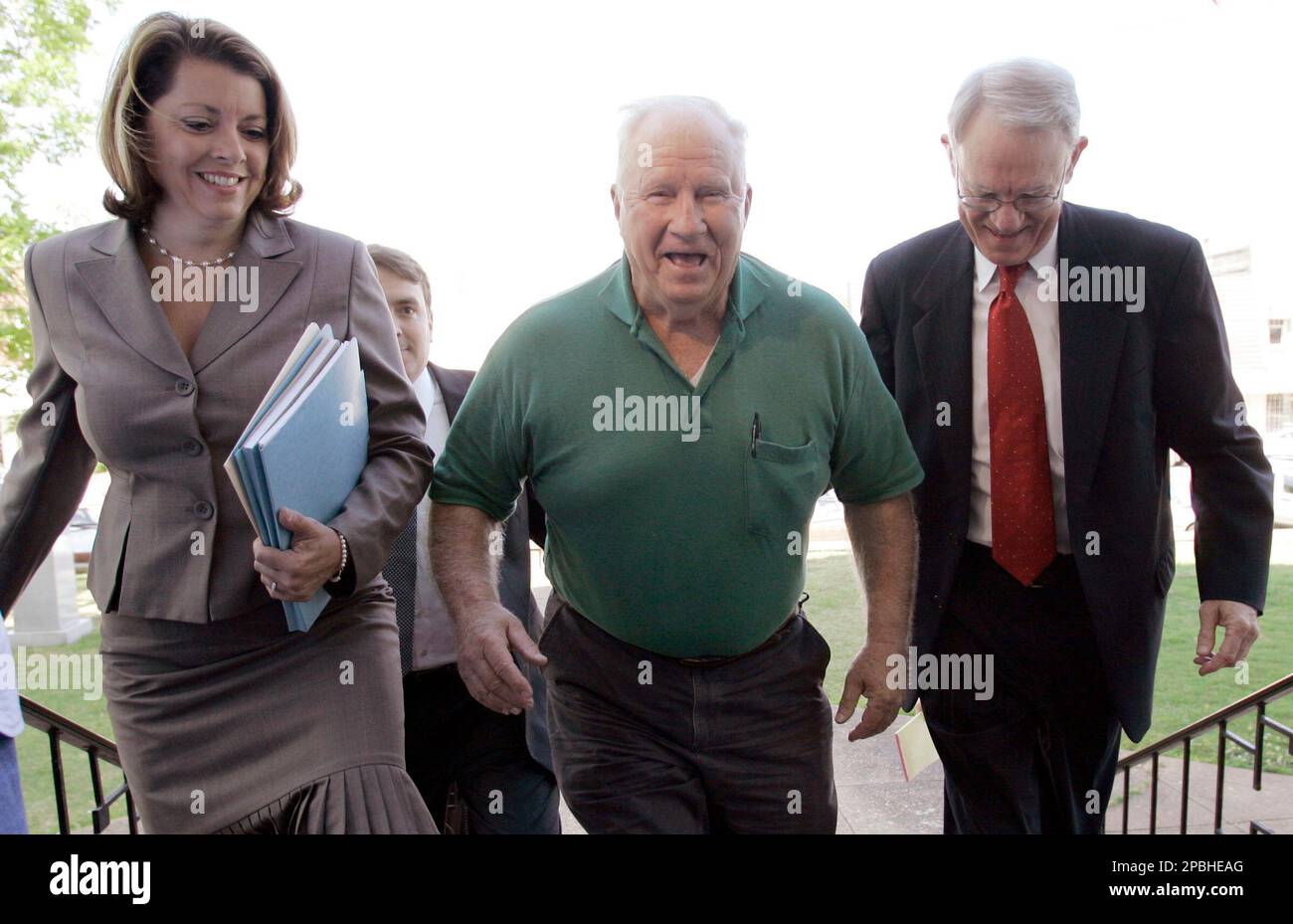 Retired Alabama state trooper James Bonard Fowler, 73, center, arrives ...