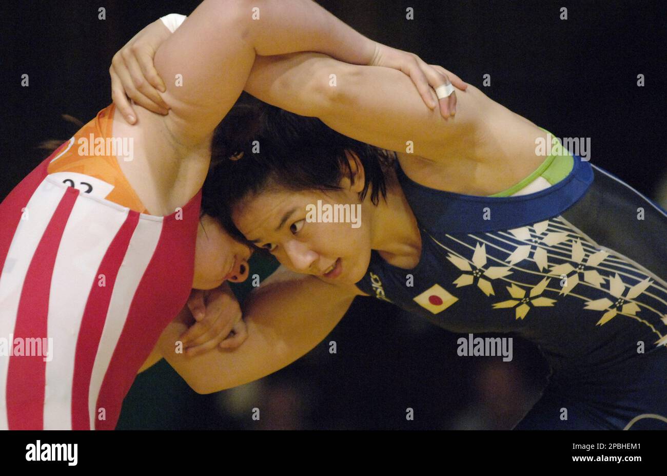 Japan's Kyoko Hamaguchi, right, and Kazakhstan's Olga Janibekova ...