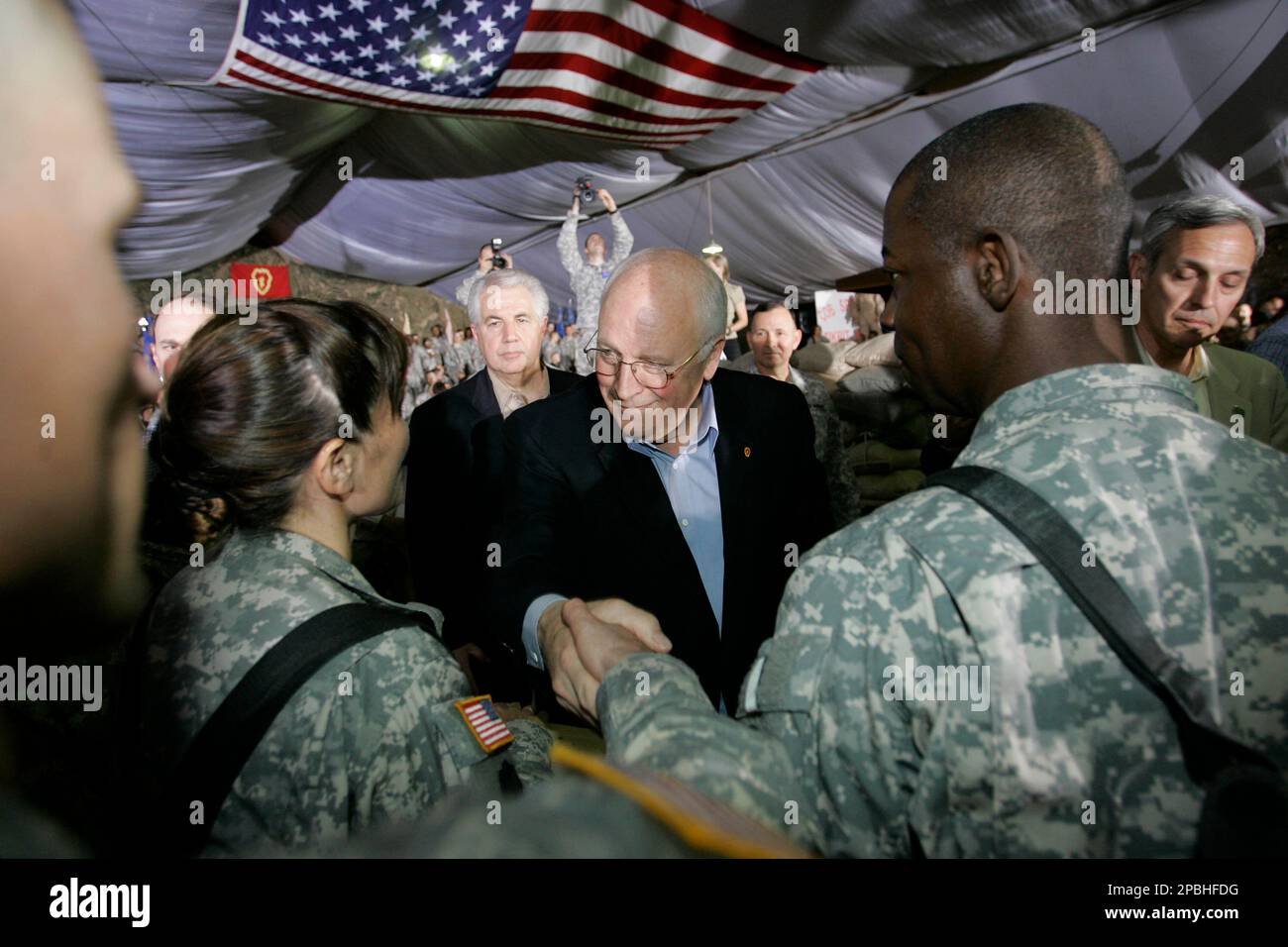 Vice President Dick Cheney participates in a rally with troops at Camp ...