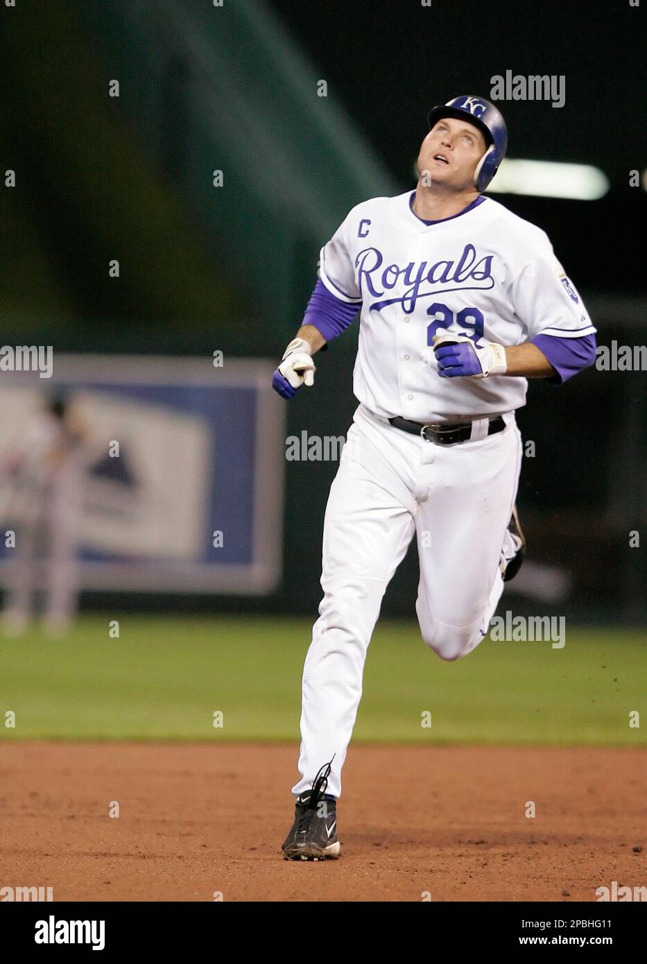 Kansas City Royals' Mike Sweeney looks skyward as he rounds second base ...