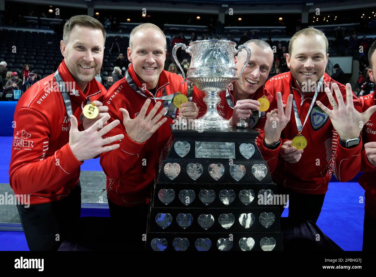 Team Canada skip Brad Gushue, left to right, celebrates with teammates ...