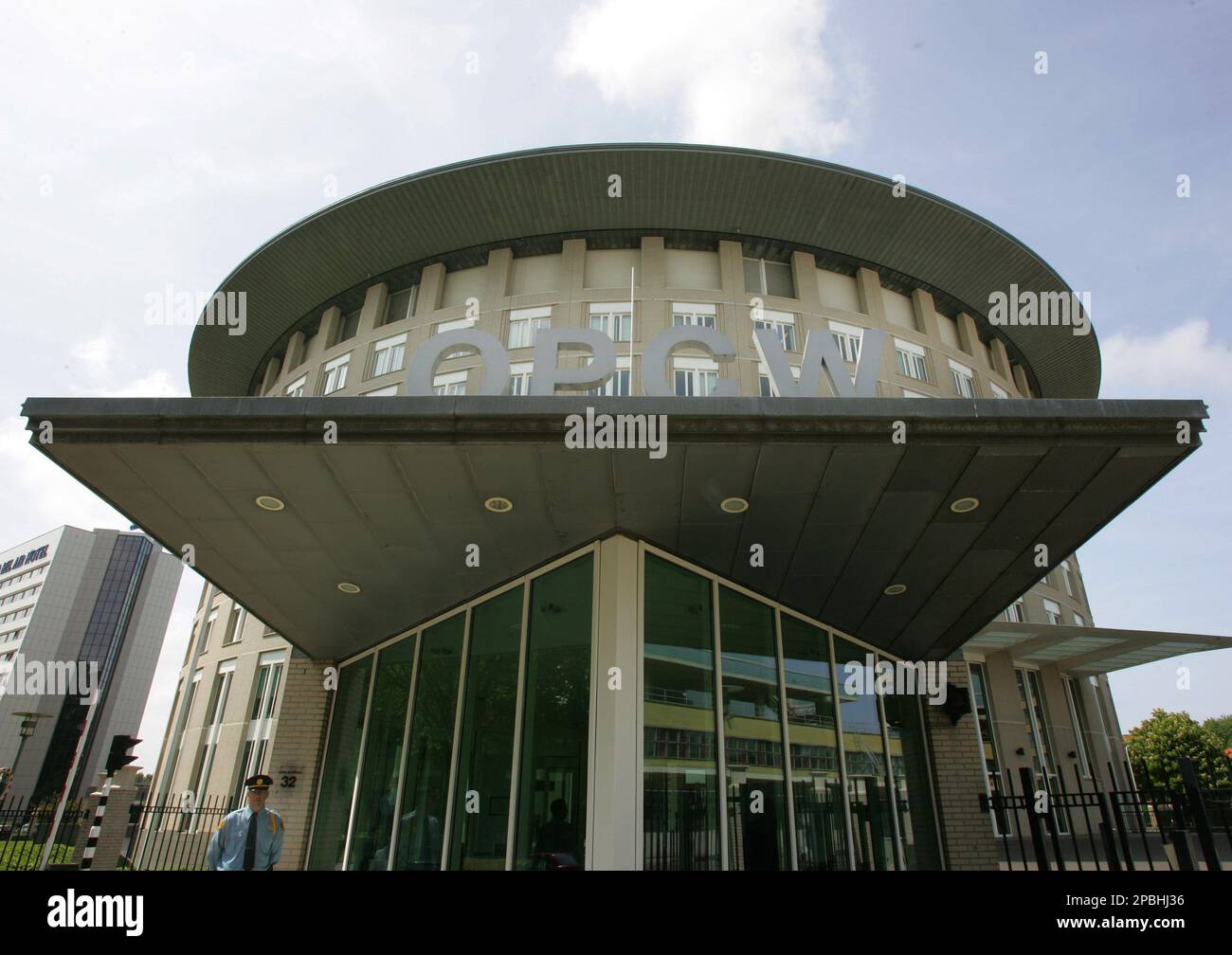 A security guard is seen at the OPCW headquarters in The Hague ...