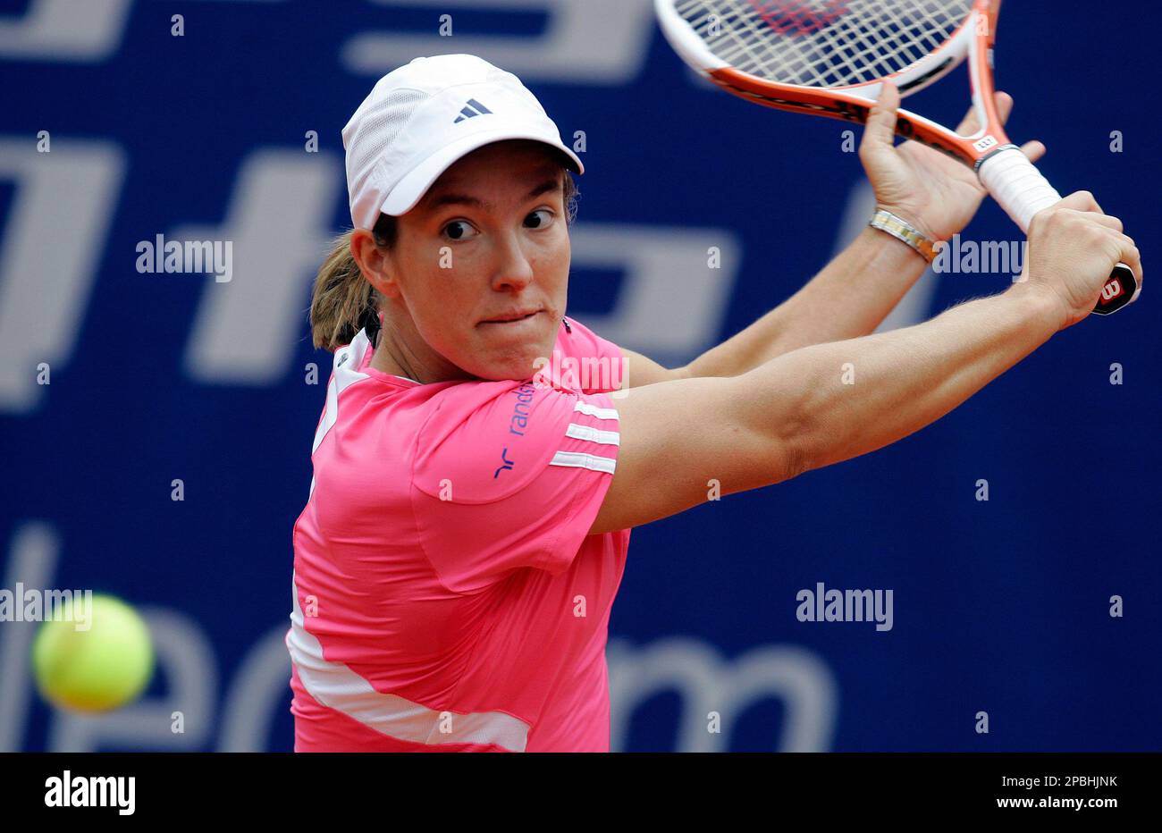 Belgium's tennis player Justine Henin hits a ball during her second ...