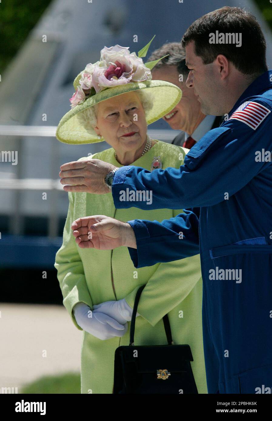 Queen Elizabeth listens to NASA Astronaut Nicholas Patrick at the NASA ...