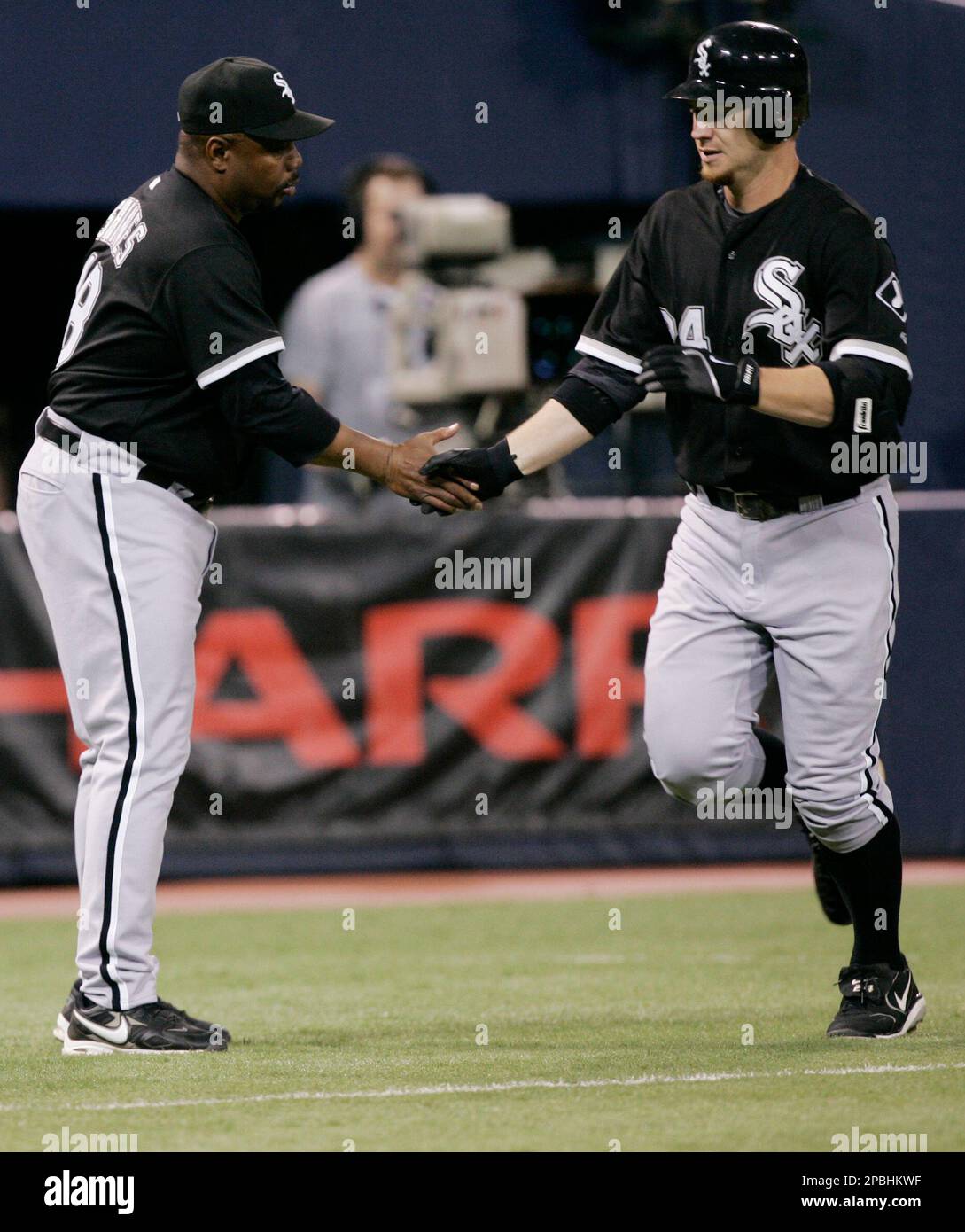 Chicago White Sox third base coach Razor Shines, left, congratulates ...
