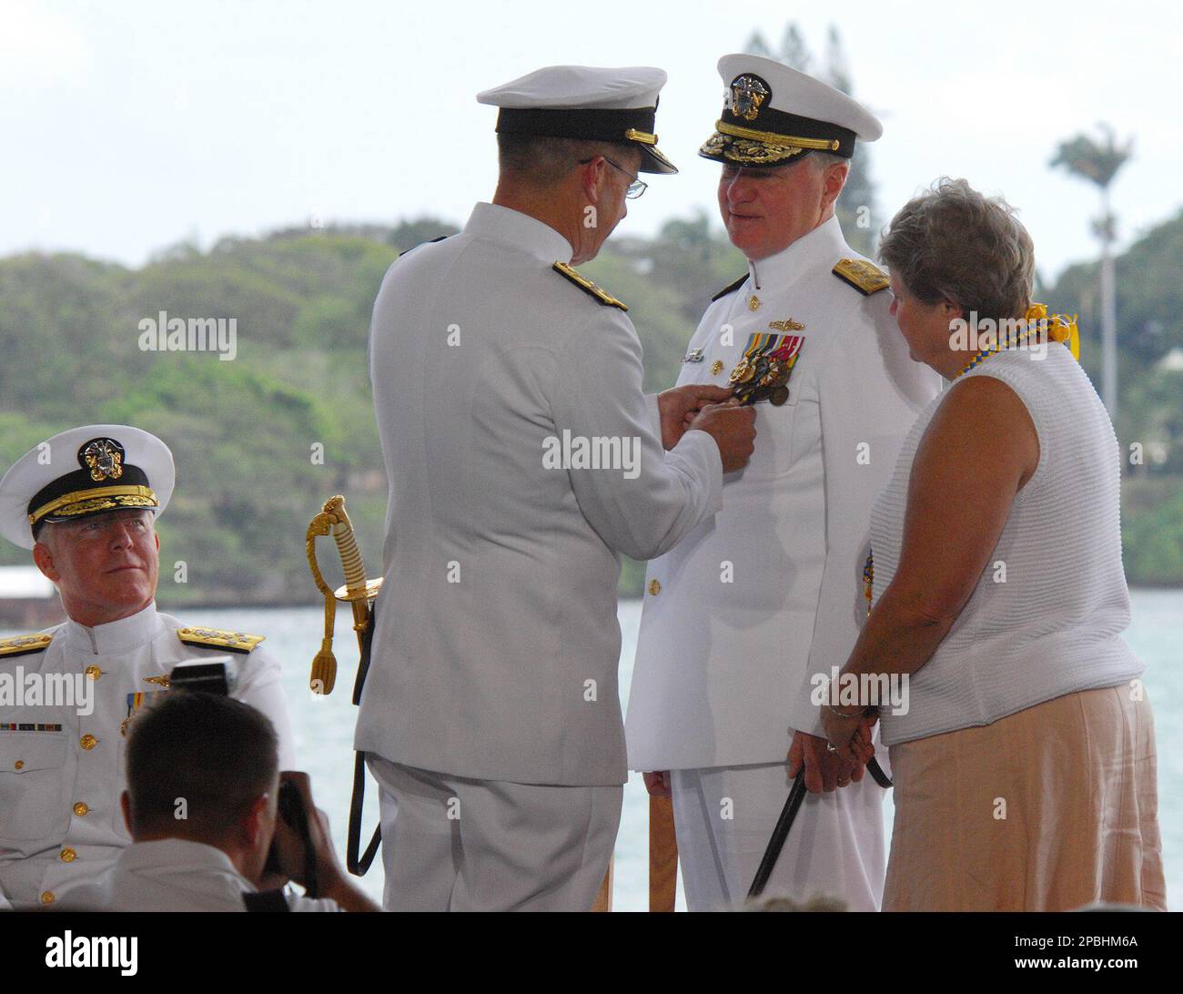 Admiral Robert Willard, far left, and Ellen Roughead, far right, look ...