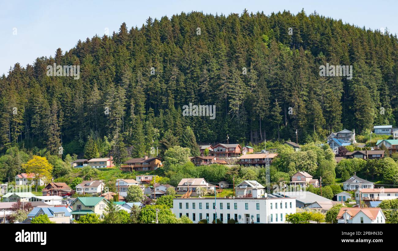 Mountain landscape. Houses of cottage village at mountain foot ...