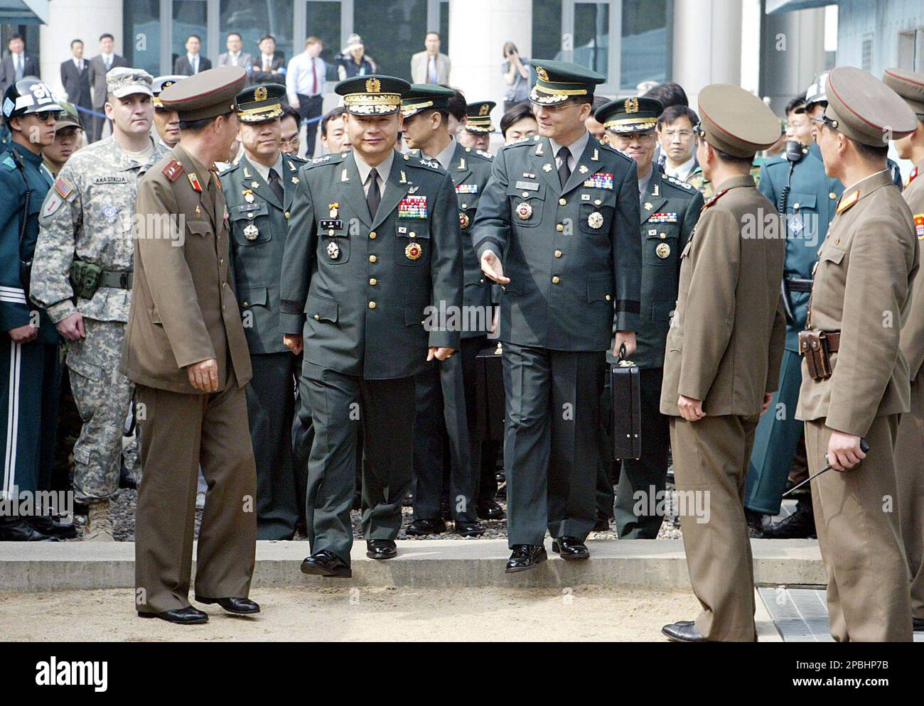 South Korean chief delegator Army Maj. Gen. Jeong Seung-jo, center left ...