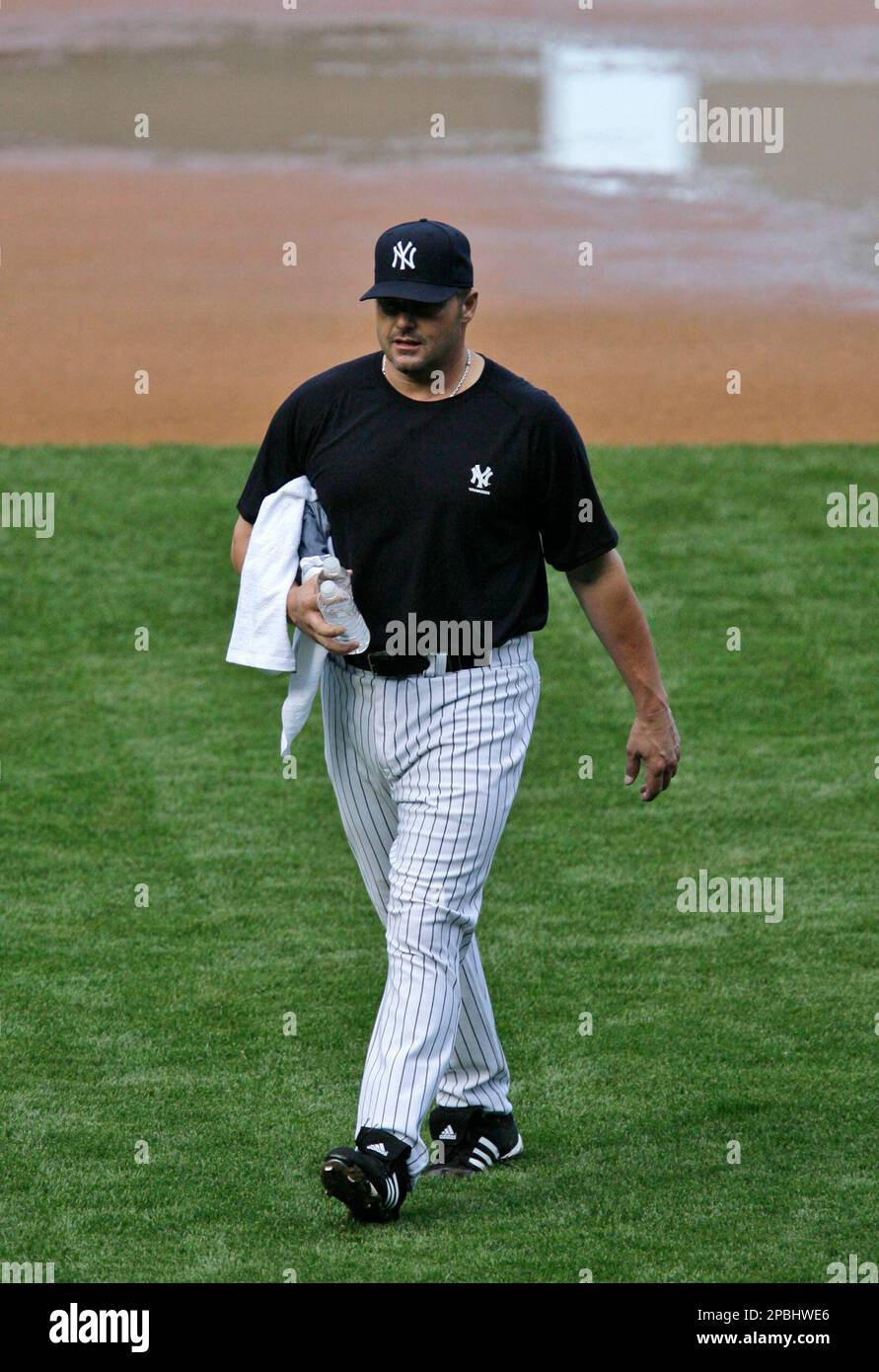 New York Yankees' Roger Clemens leaves the field at Yankee Stadium in ...