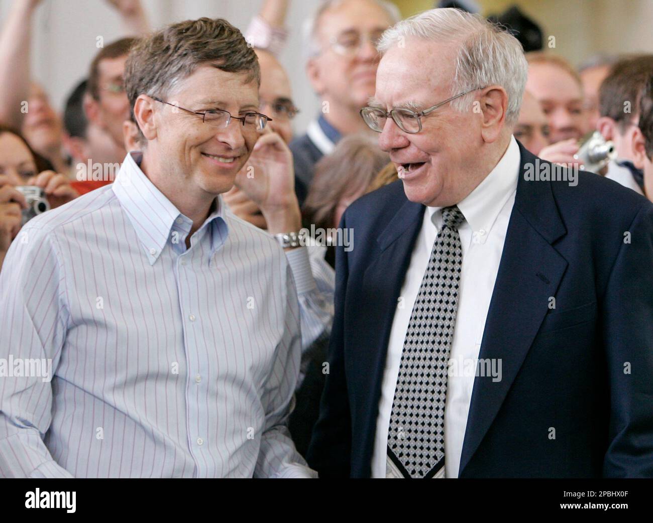 Bill Gates, left, and Warren Buffett share a light moment during the ...