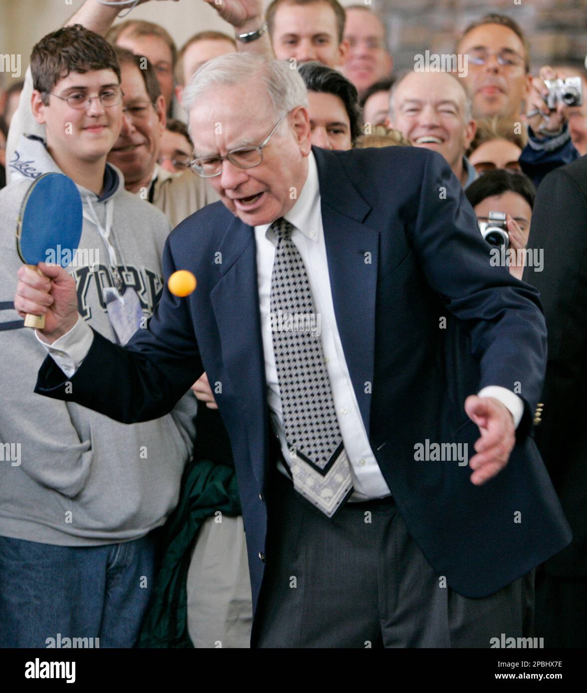 Warren Buffett plays table tennis at the annual Berkshire Hathaway ...