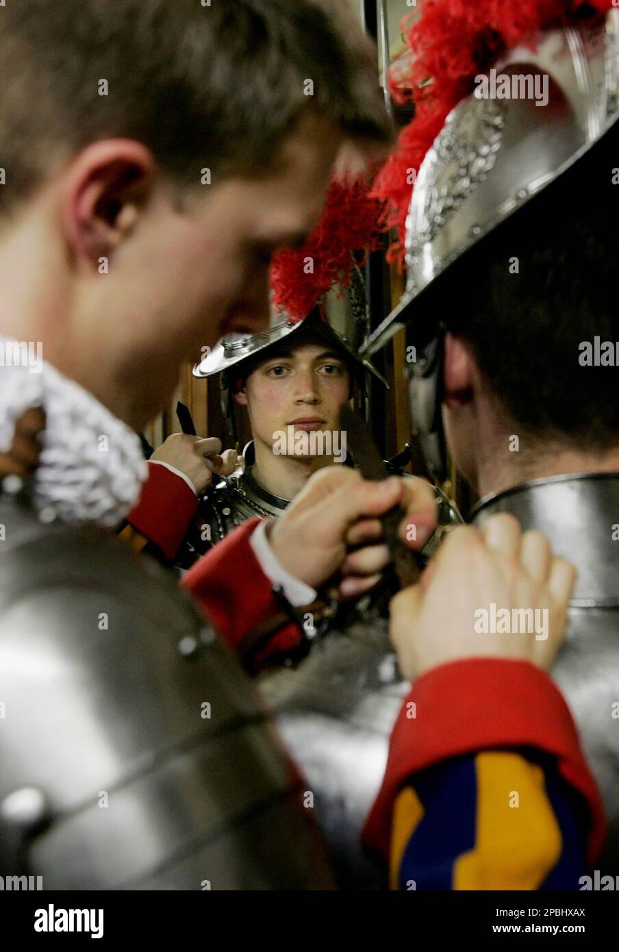 New recruits of the Vatican's Swiss Guards prepare their uniforms ...