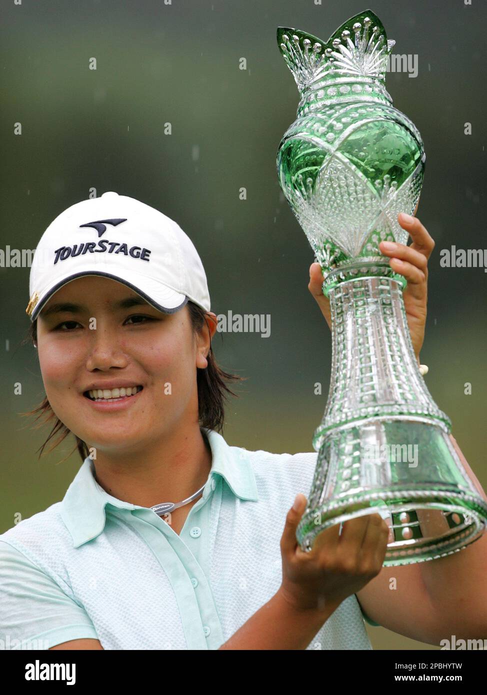 South Korea's Jeon Mi-jeong holds her trophy at the awarding ceremony ...