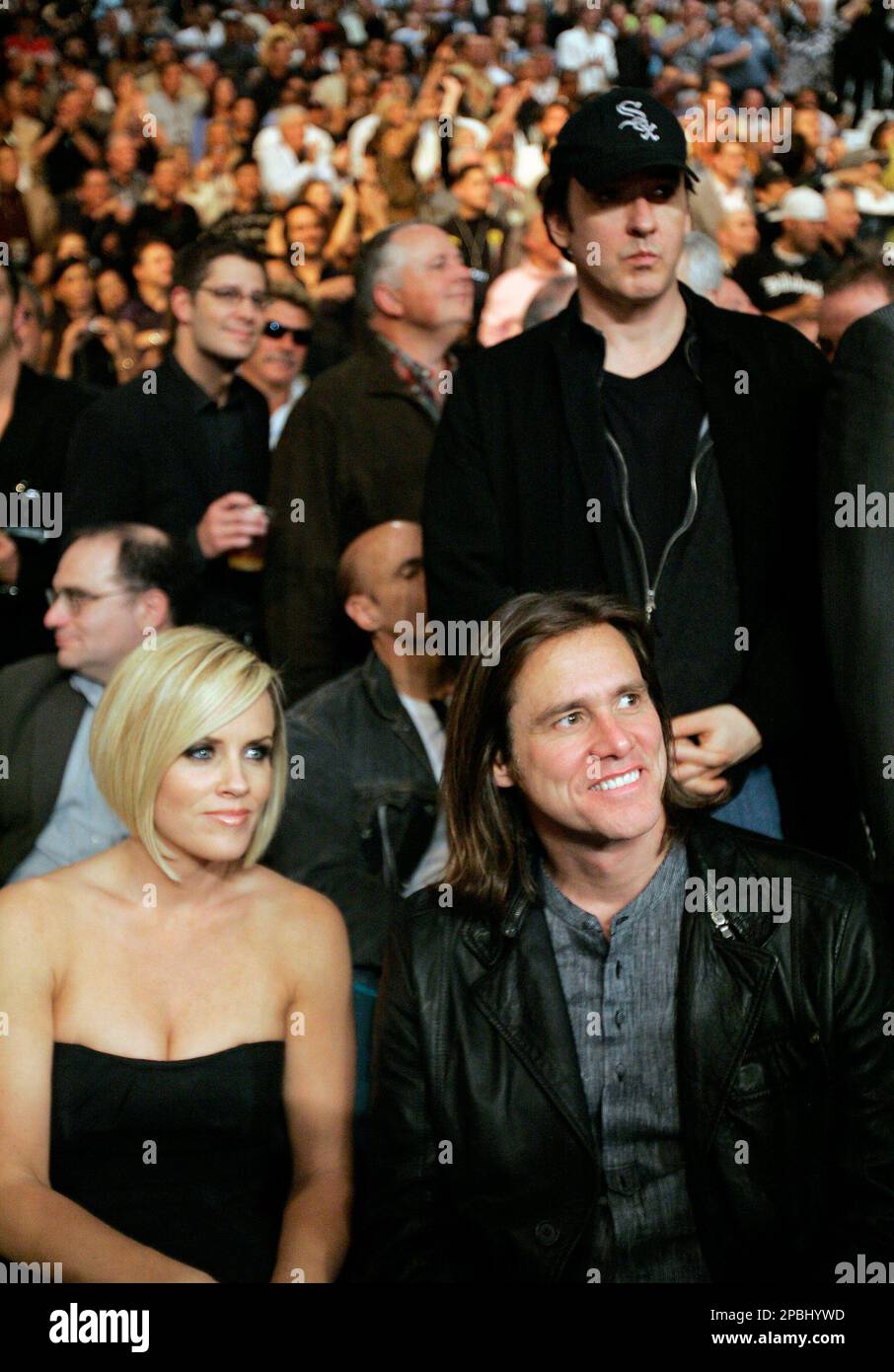 Actor Jim Carrey, bottom right, actress Jenny McCarthy, left, and John ...