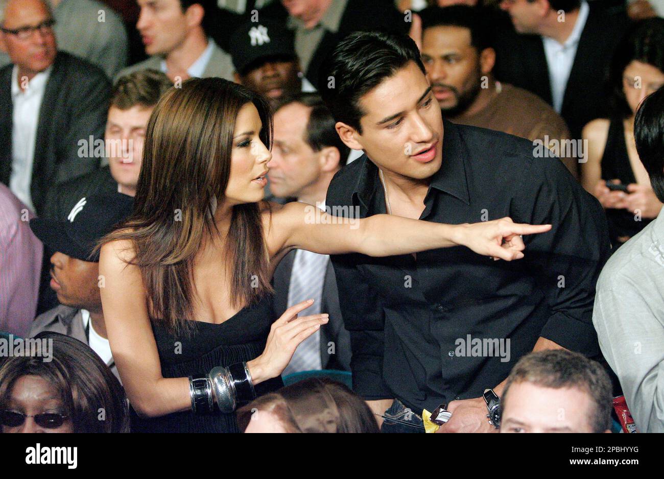 Eva Longoria, left, and Mario Lopez are seen at the Oscar De La Hoya ...